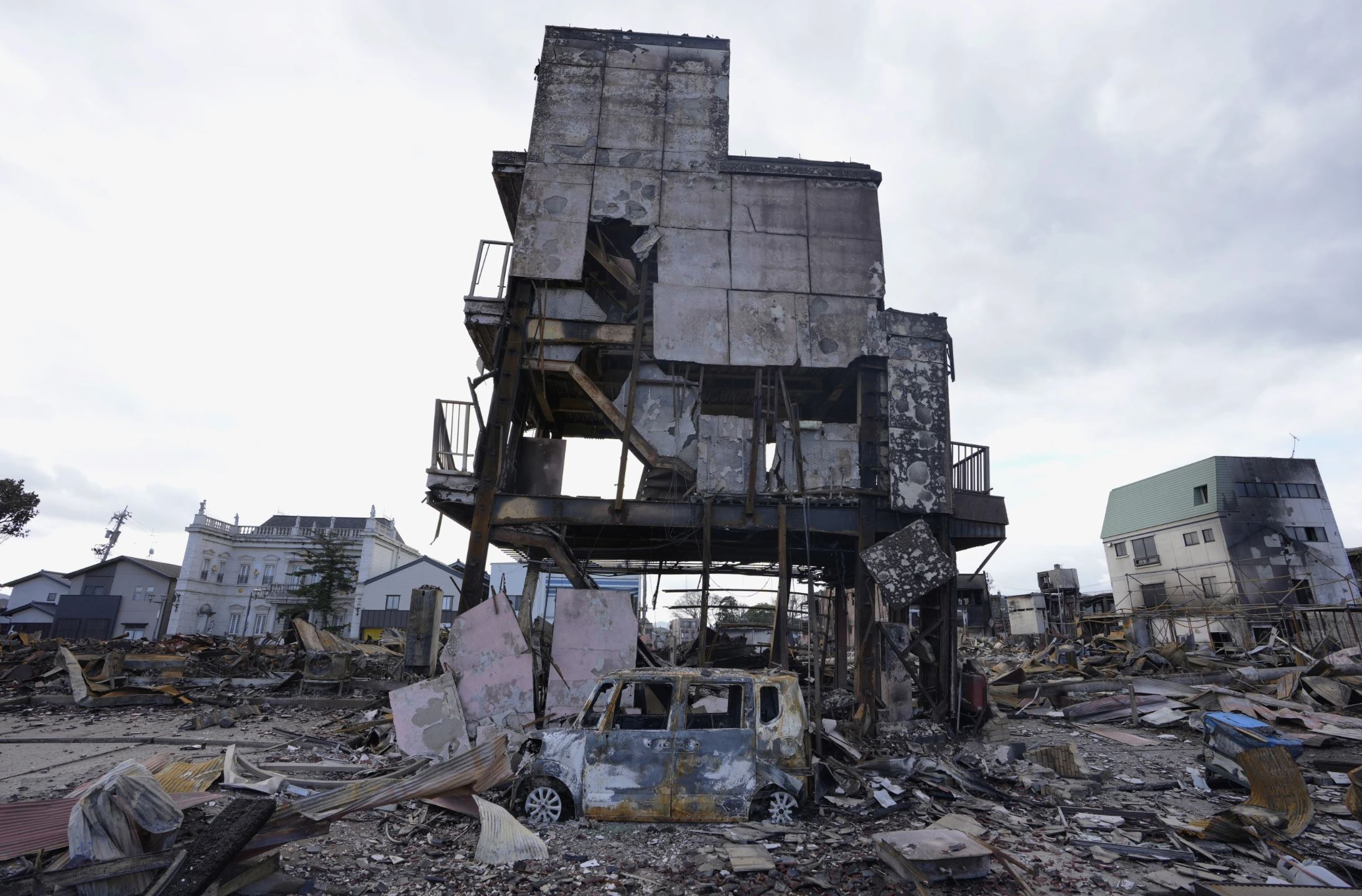 Death toll from western Japan earthquakes rises to 126 as rain and snow imperil already shaky ...