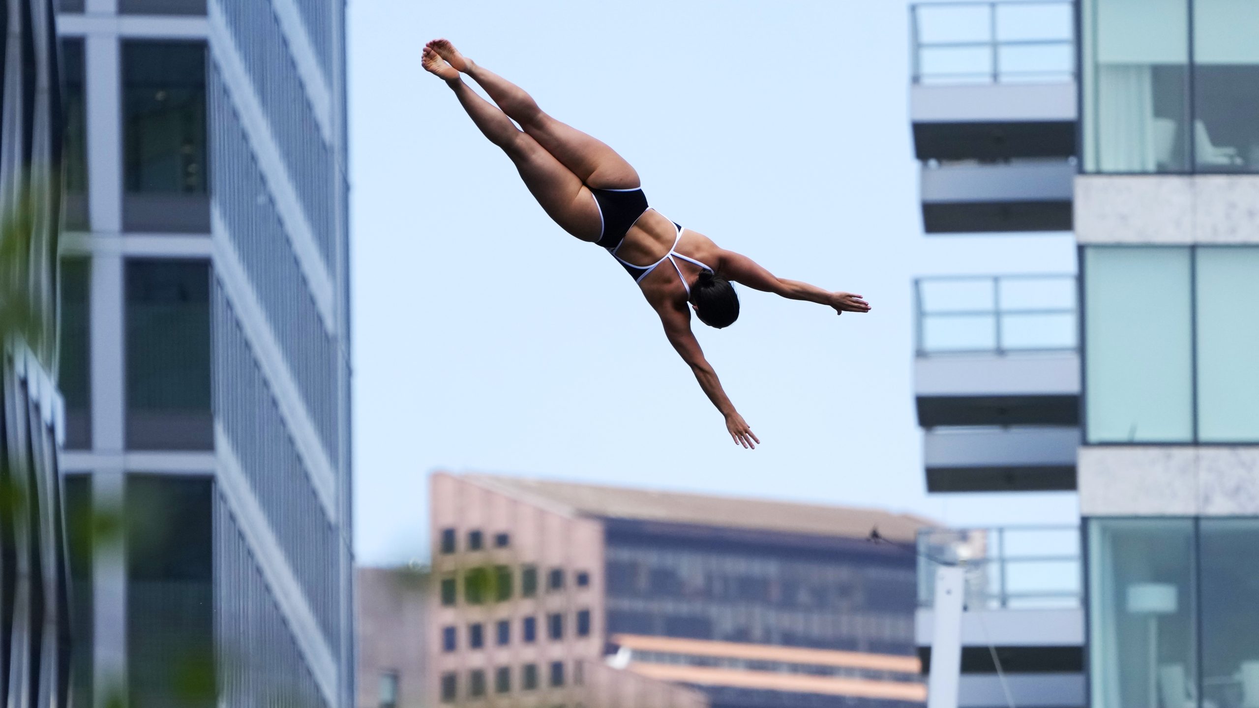 Cliff divers ready to plunge 90 feet from a Boston art museum in sport ...