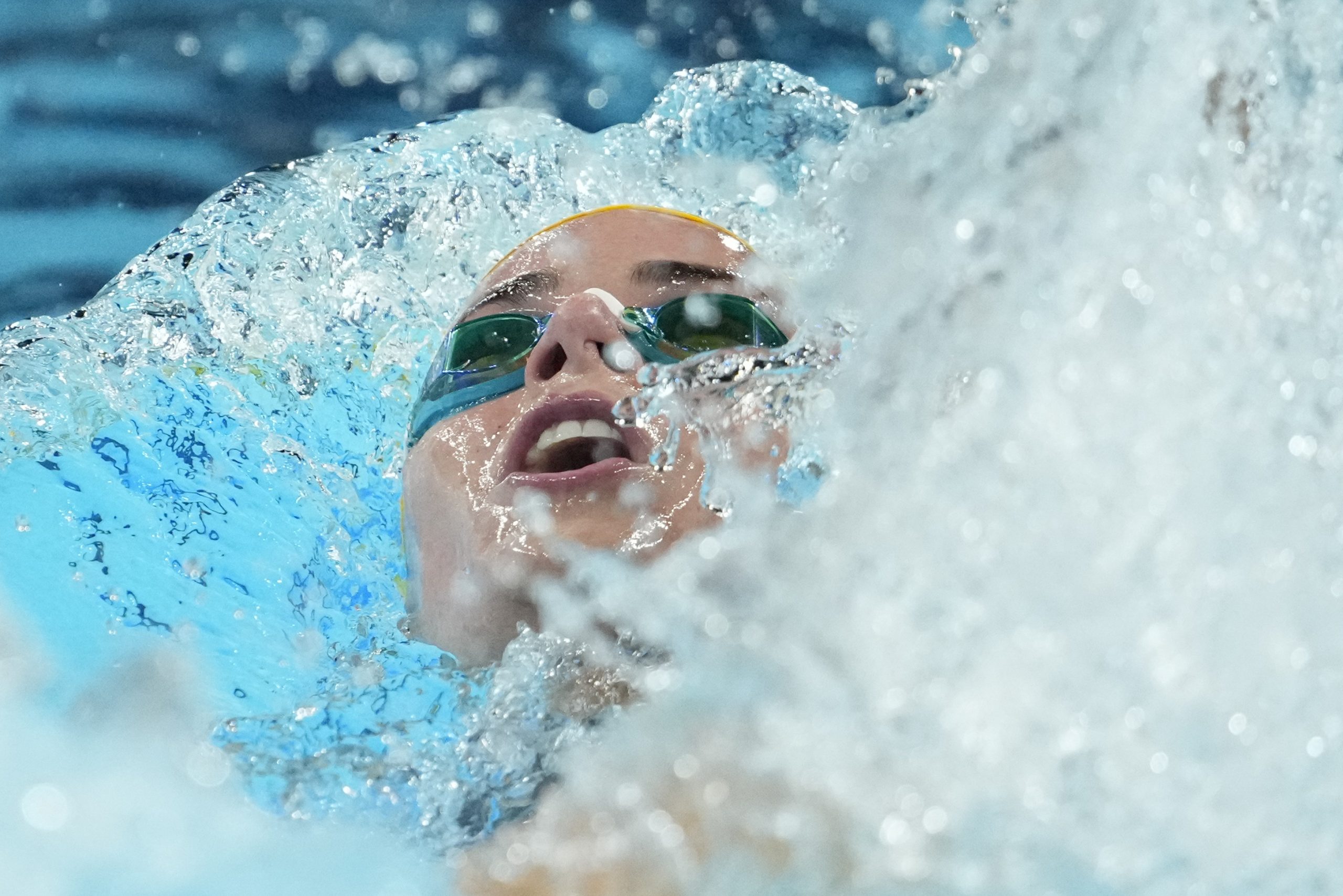 Australian swimmer Kaylee McKeown wins 100-meter backstroke; Americans ...