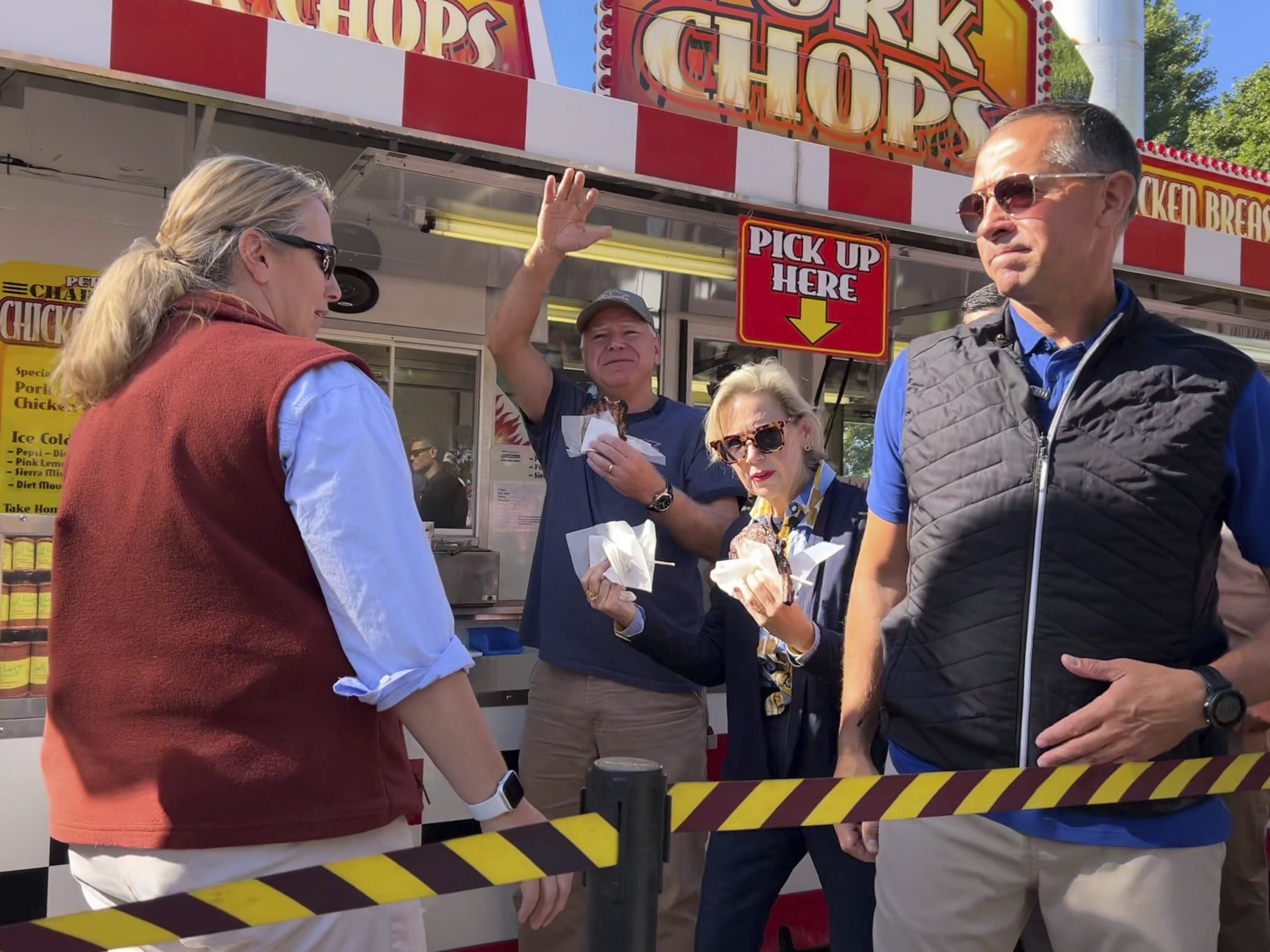 It's a pork chop on a stick and a vanilla shake for Tim Walz at the ...
