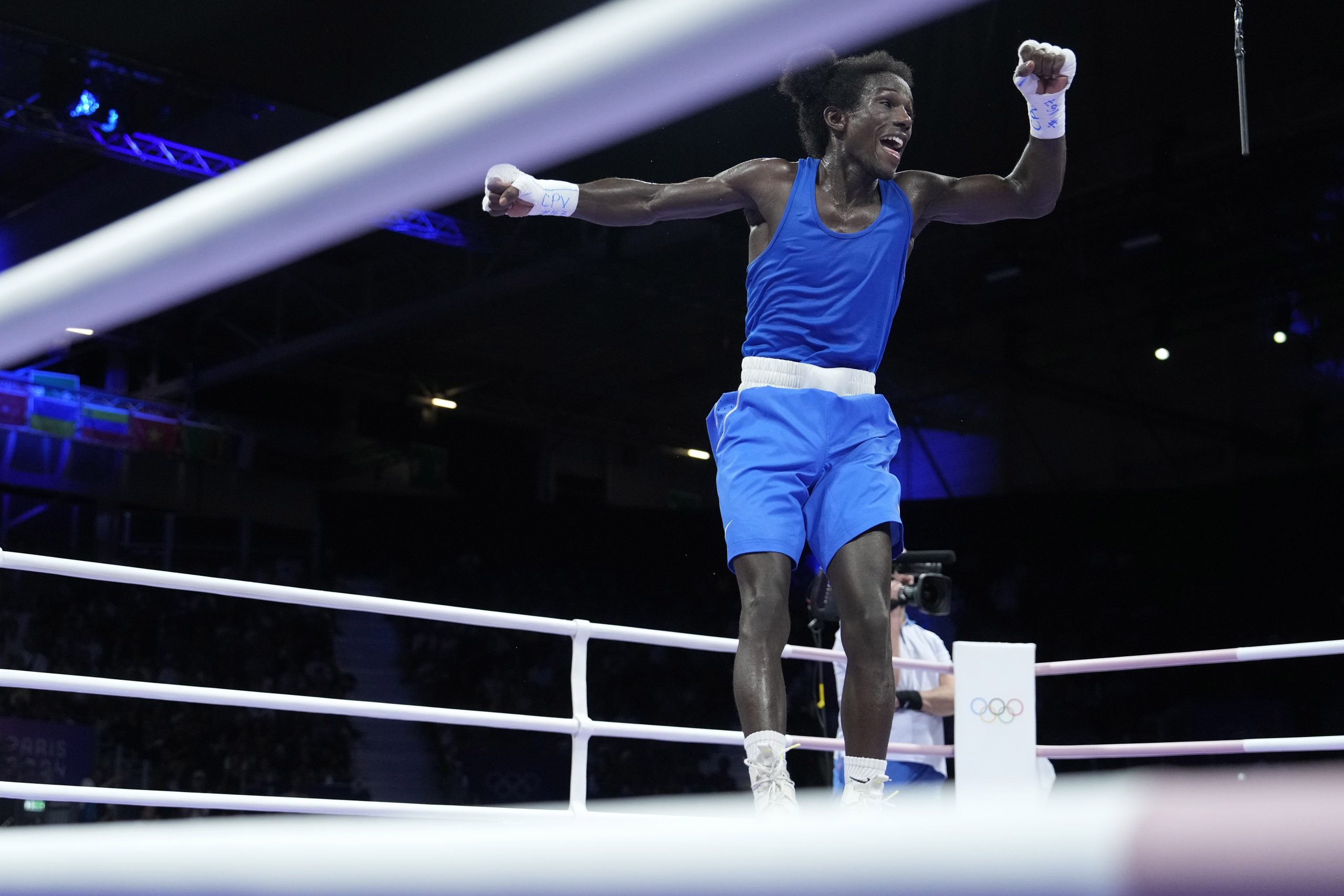 Jubilant boxer David De Pina secures the first-ever Olympic medal for ...
