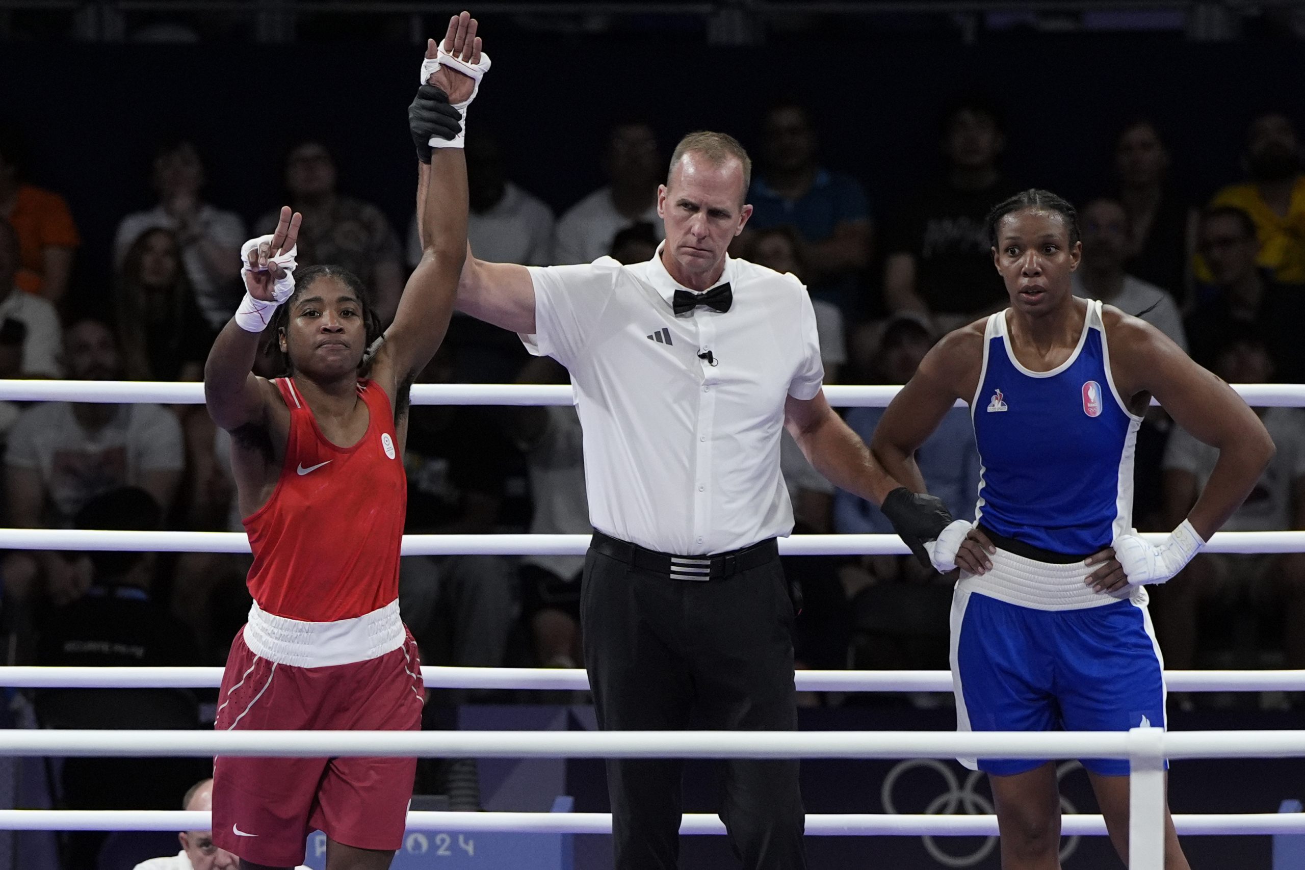 Boxer Cindy Ngamba is the refugee team’s first athlete to clinch a ...