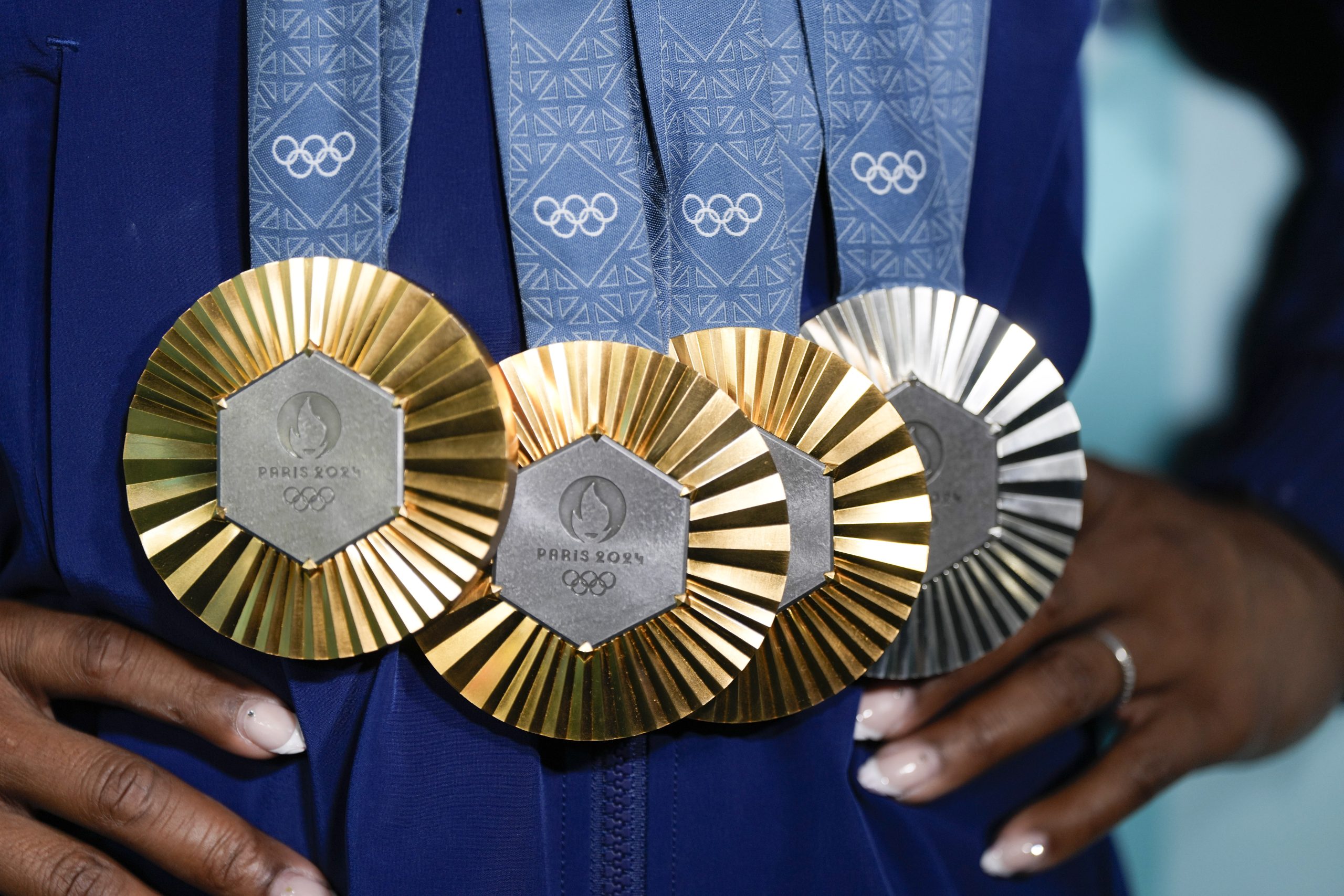 U.S. again beats China in Olympic medals table after they tie for gold ...