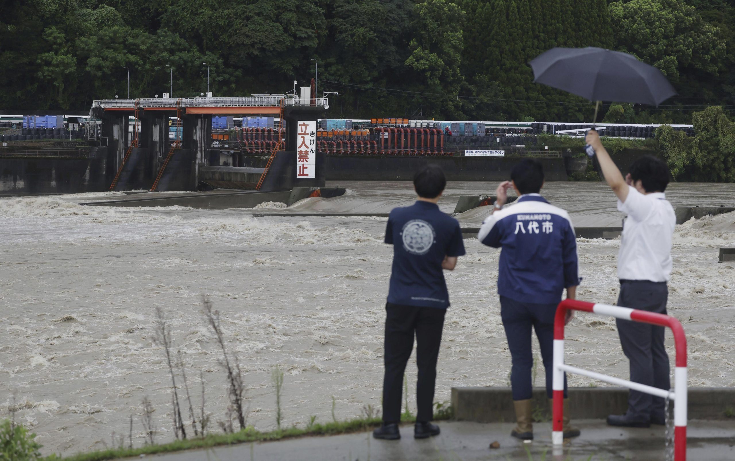 Slow tropical storm dumps heavy rain around Tokyo after causing floods ...