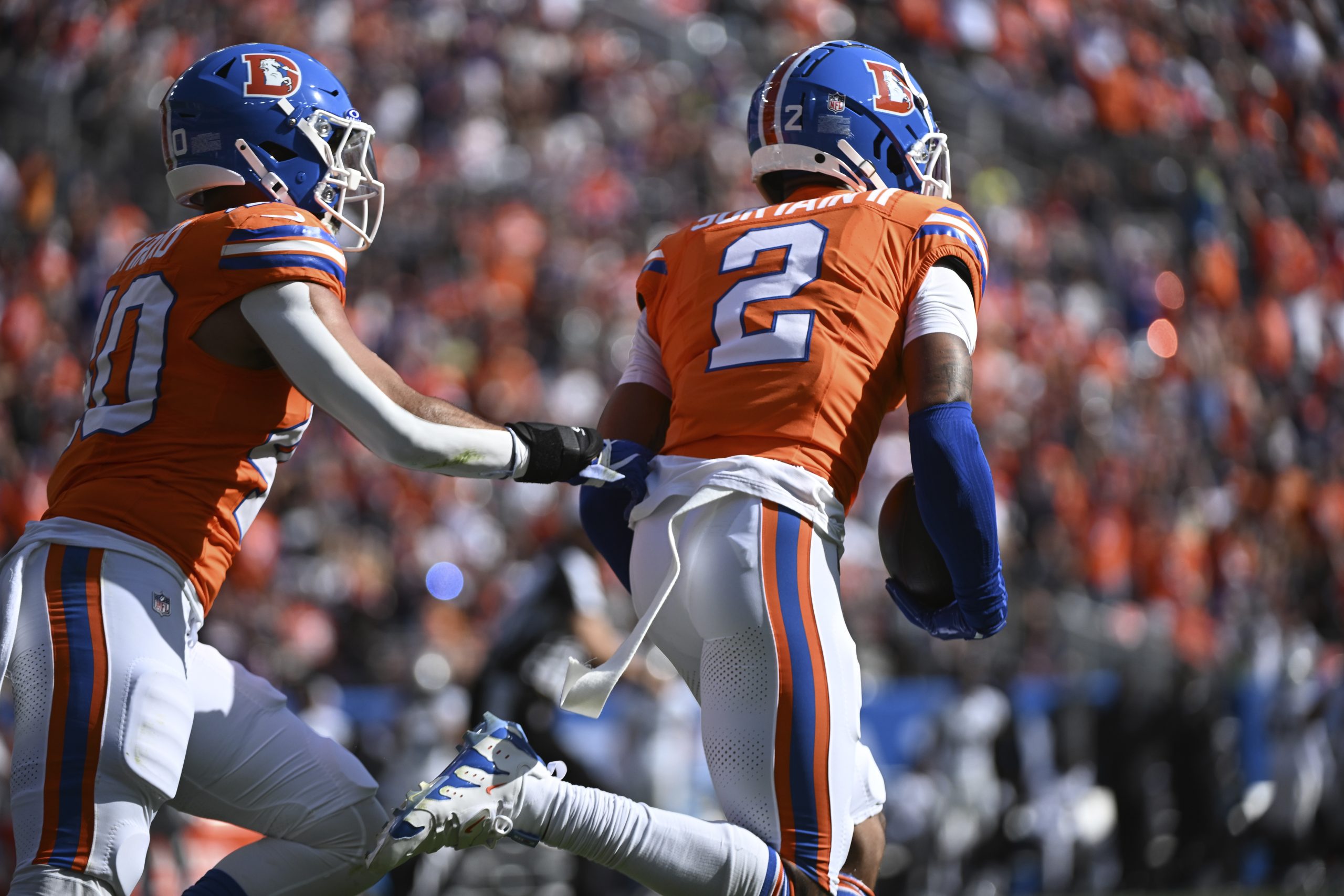Surtain's two interceptions power Broncos past Raiders 34-18, snapping ...