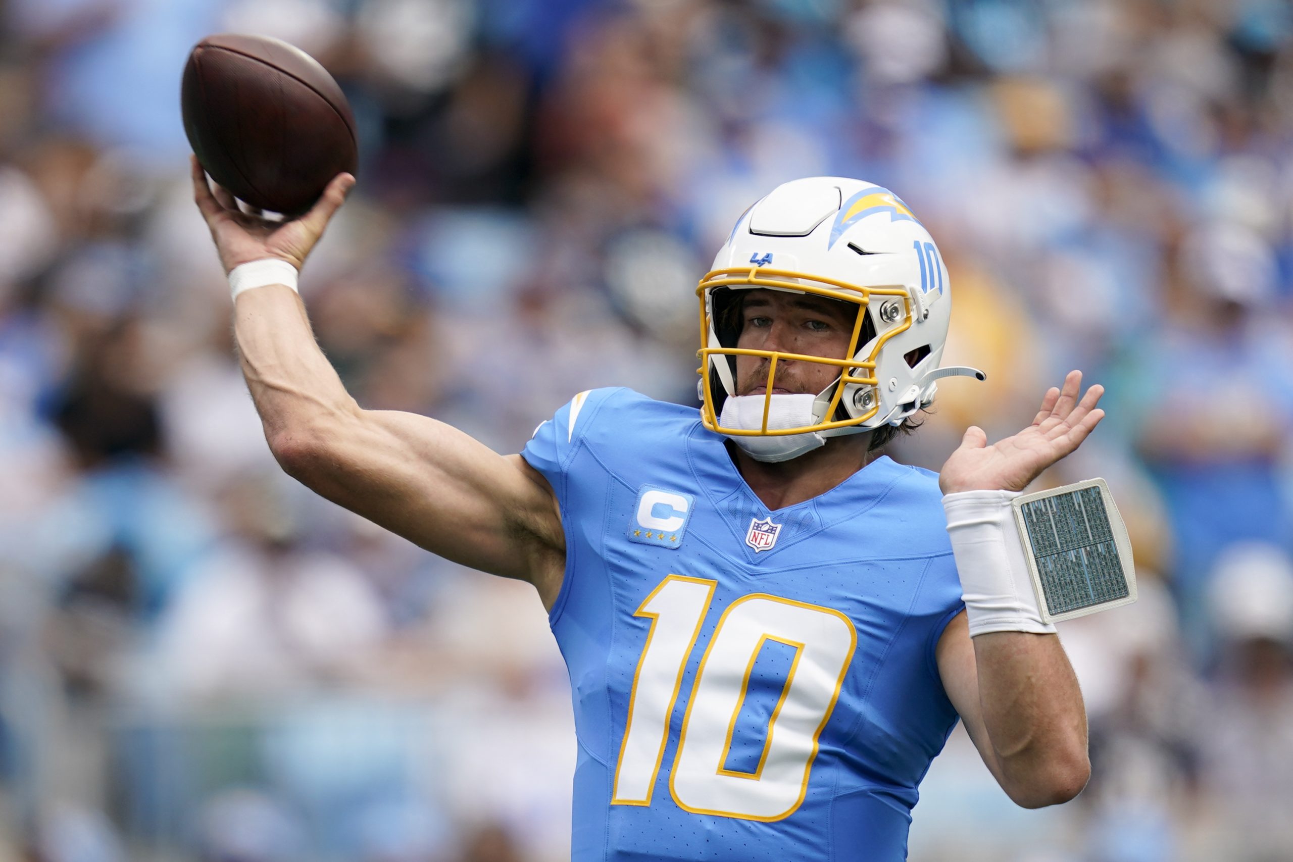 Chargers QB Justin Herbert doesn't practice because of right ankle ...