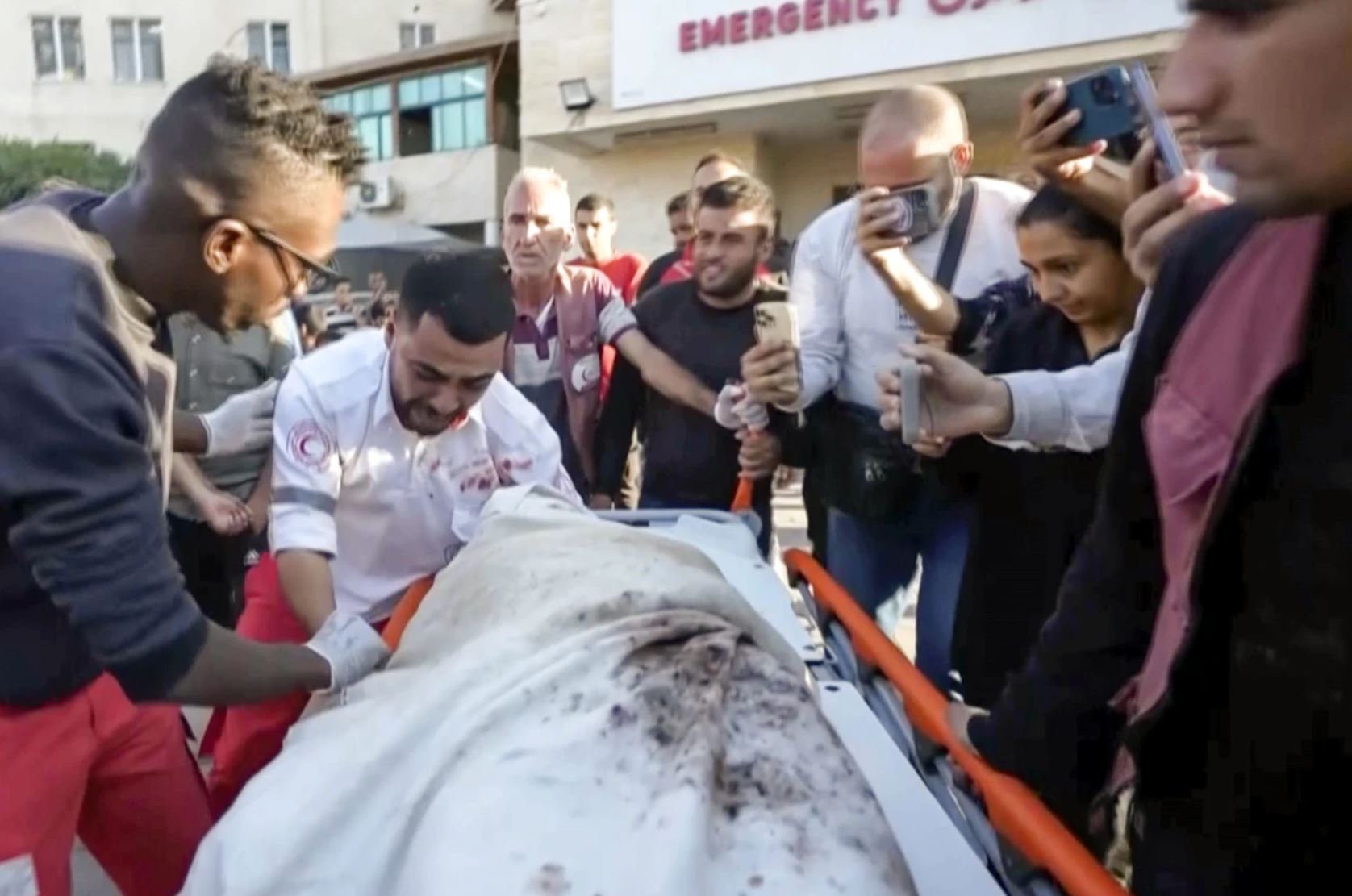 A Gaza medic realizes he’s carrying his own mother’s body, killed by an ...