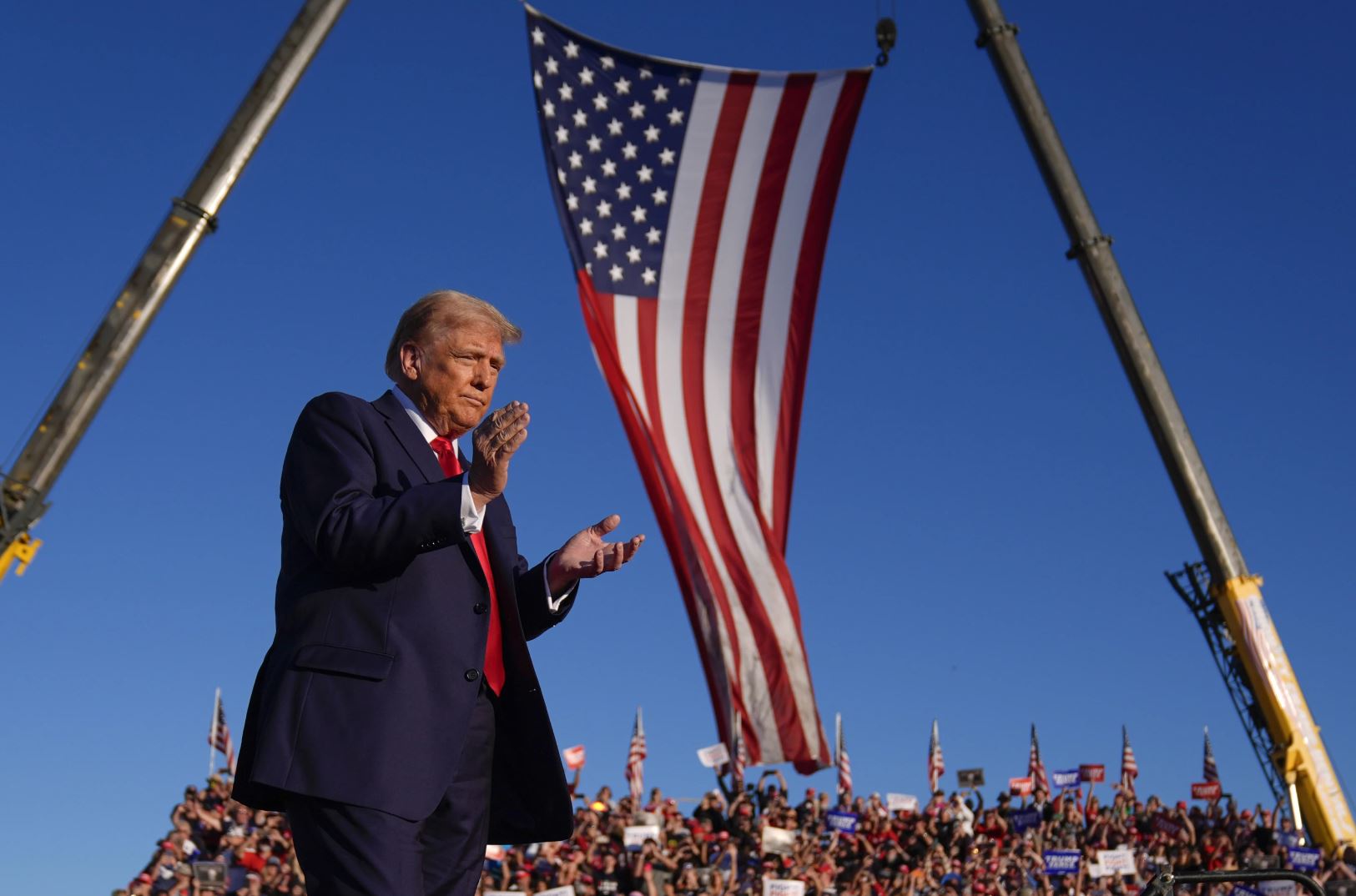 Trump urges his supporters to deliver victory in his return to scene of ...