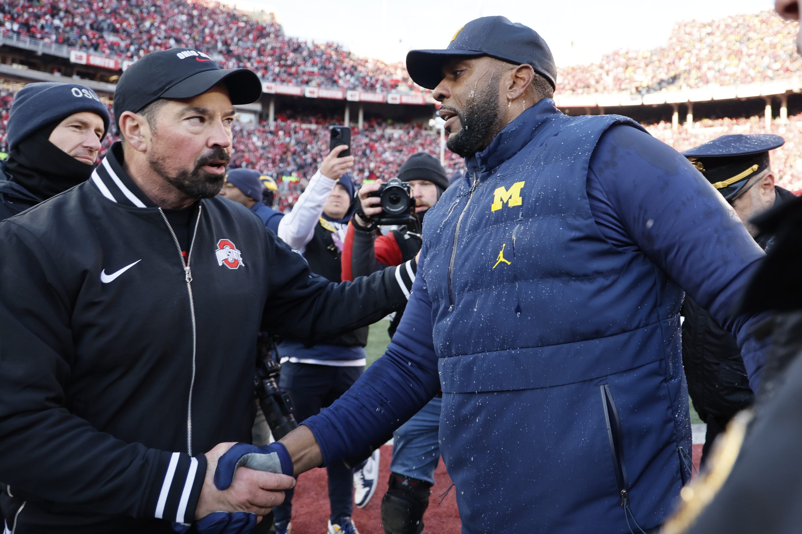 Michigan, Ohio State fight broken up with police pepper spray after Wolverines stun Buckeyes 13 ...