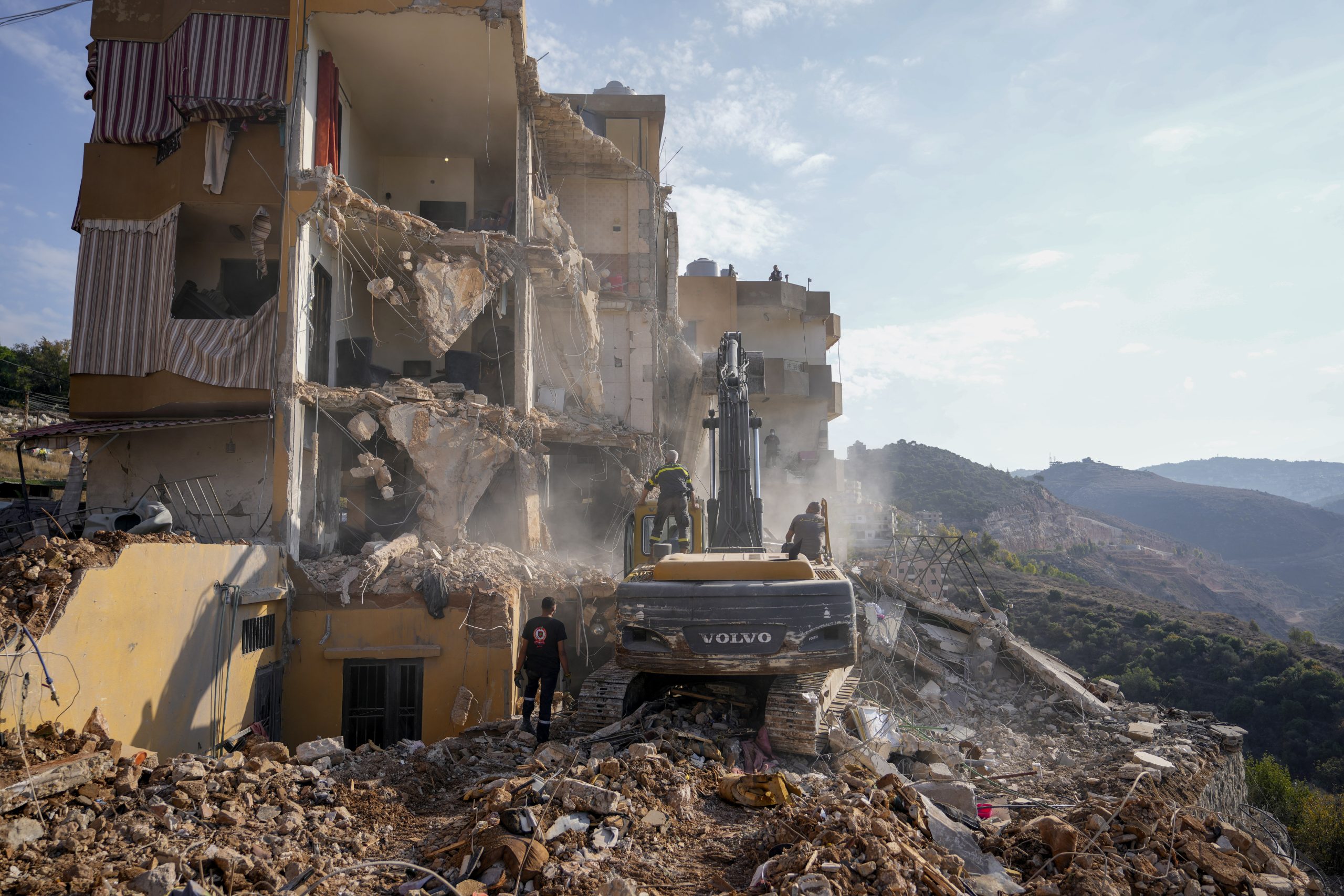 Rescuers pull 30 bodies from a building in central Lebanon hit in an ...