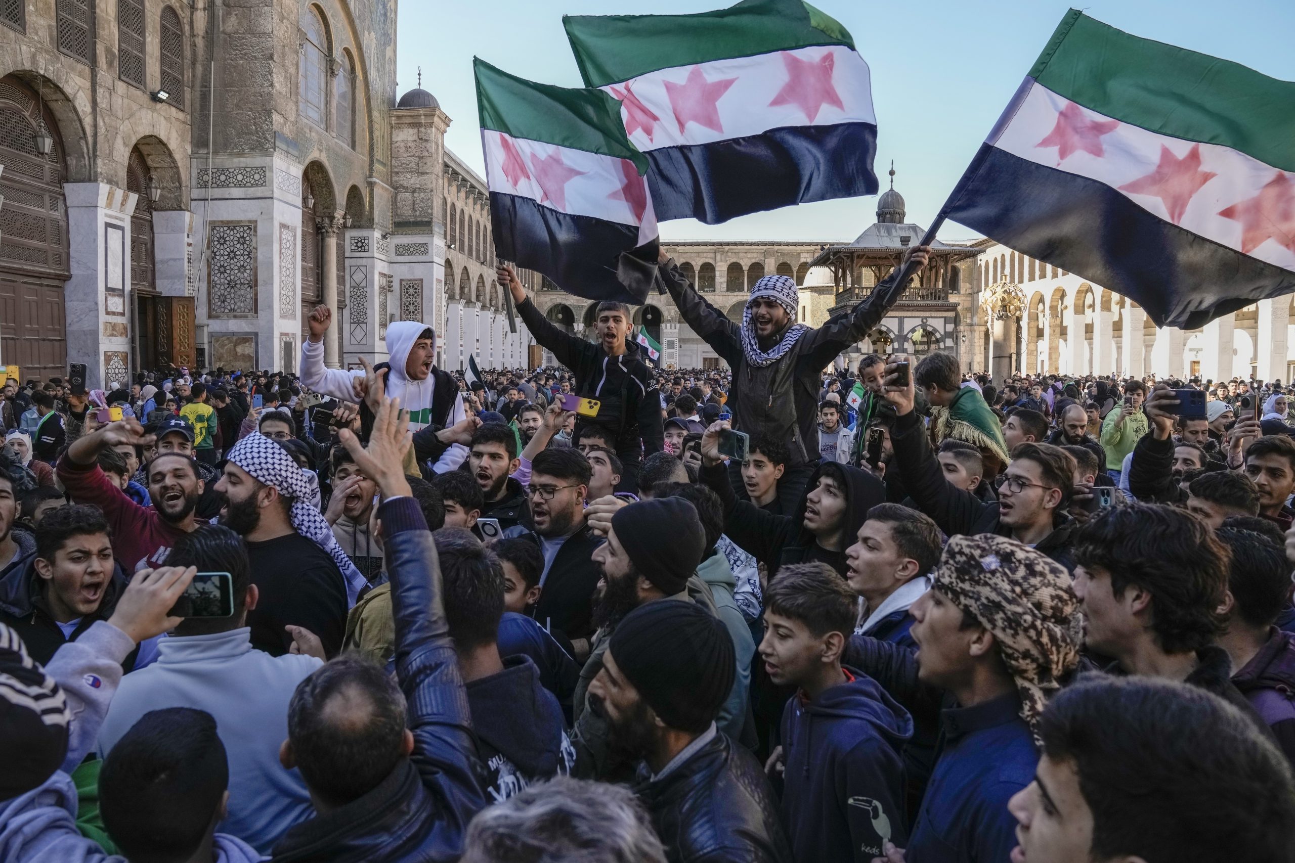Thousands of Syrian celebrate in central Damascus during first Friday ...