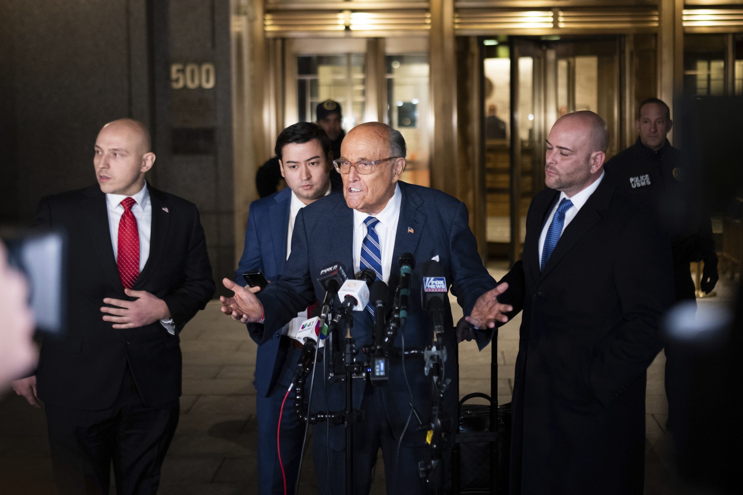 Judge will weigh holding Giuliani in contempt of court after jury’s ...