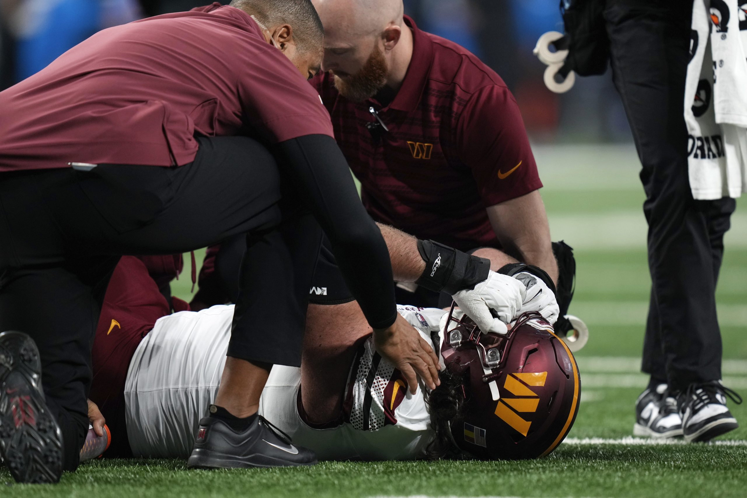 Commanders right guard Sam Cosmi has a torn ACL. He is out for the ...