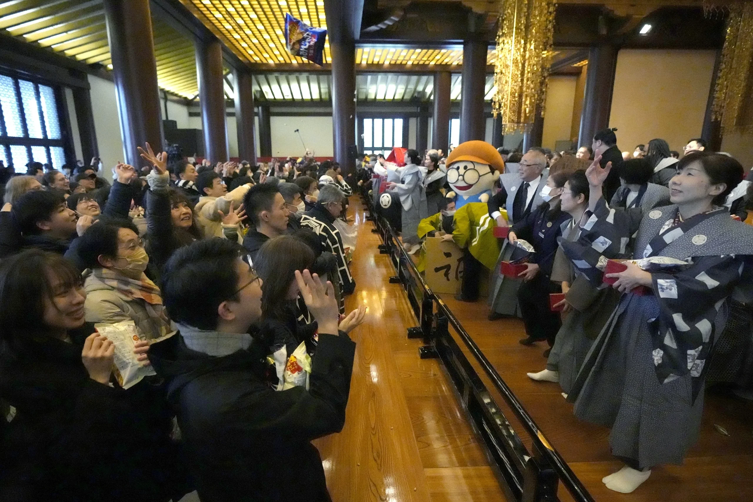 Japanese mark the end of winter with bean-throwing ritual to ward off ...