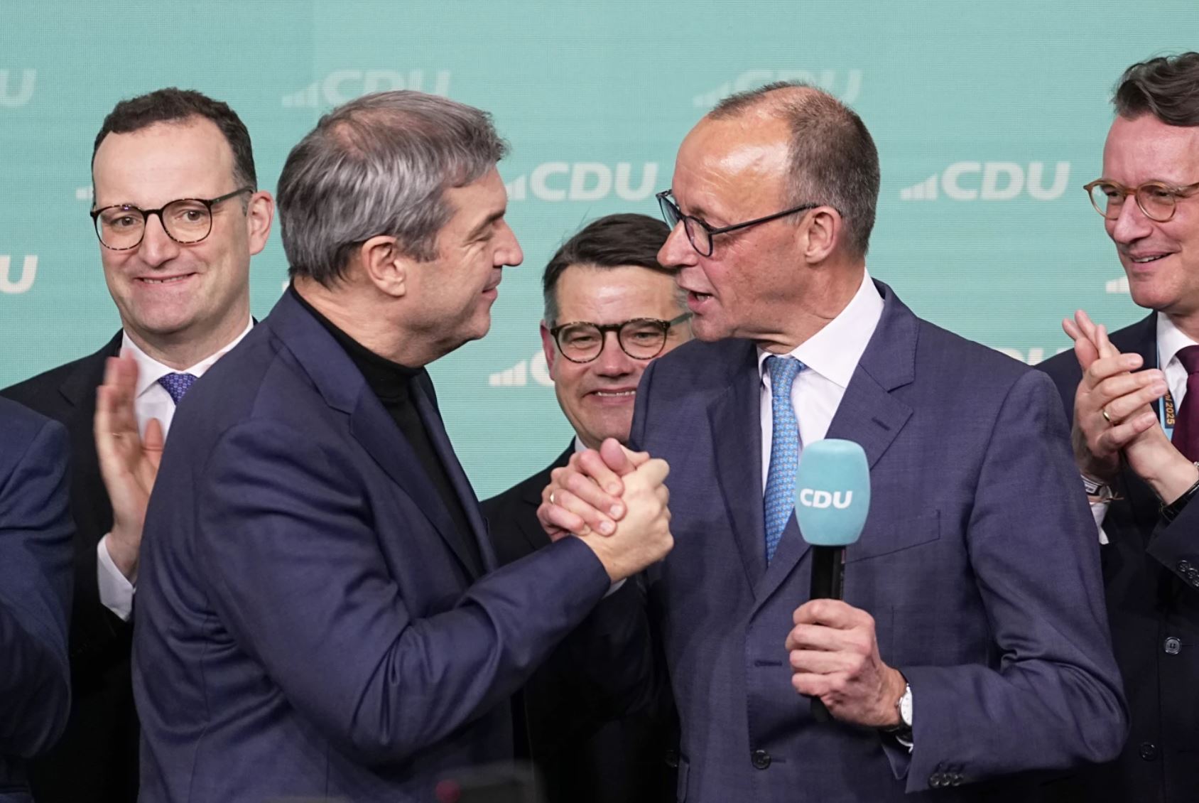 German center-right leader Merz says election win shows Germany is ...