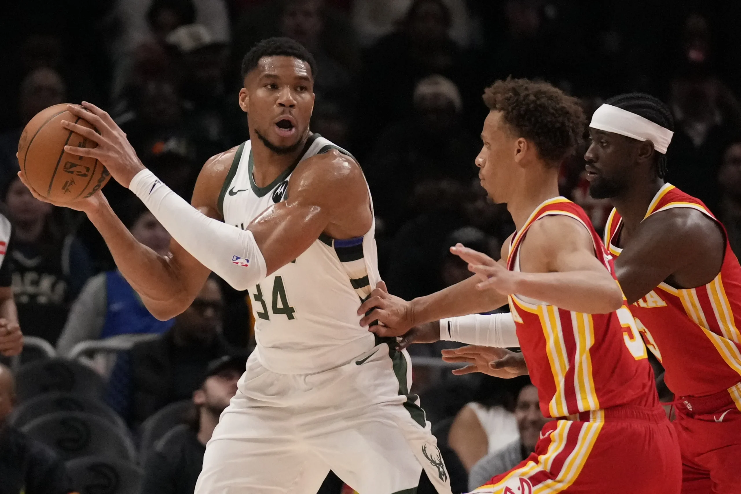 Giannis Antetokounmpo posts triple-double as surging Bucks finish ...
