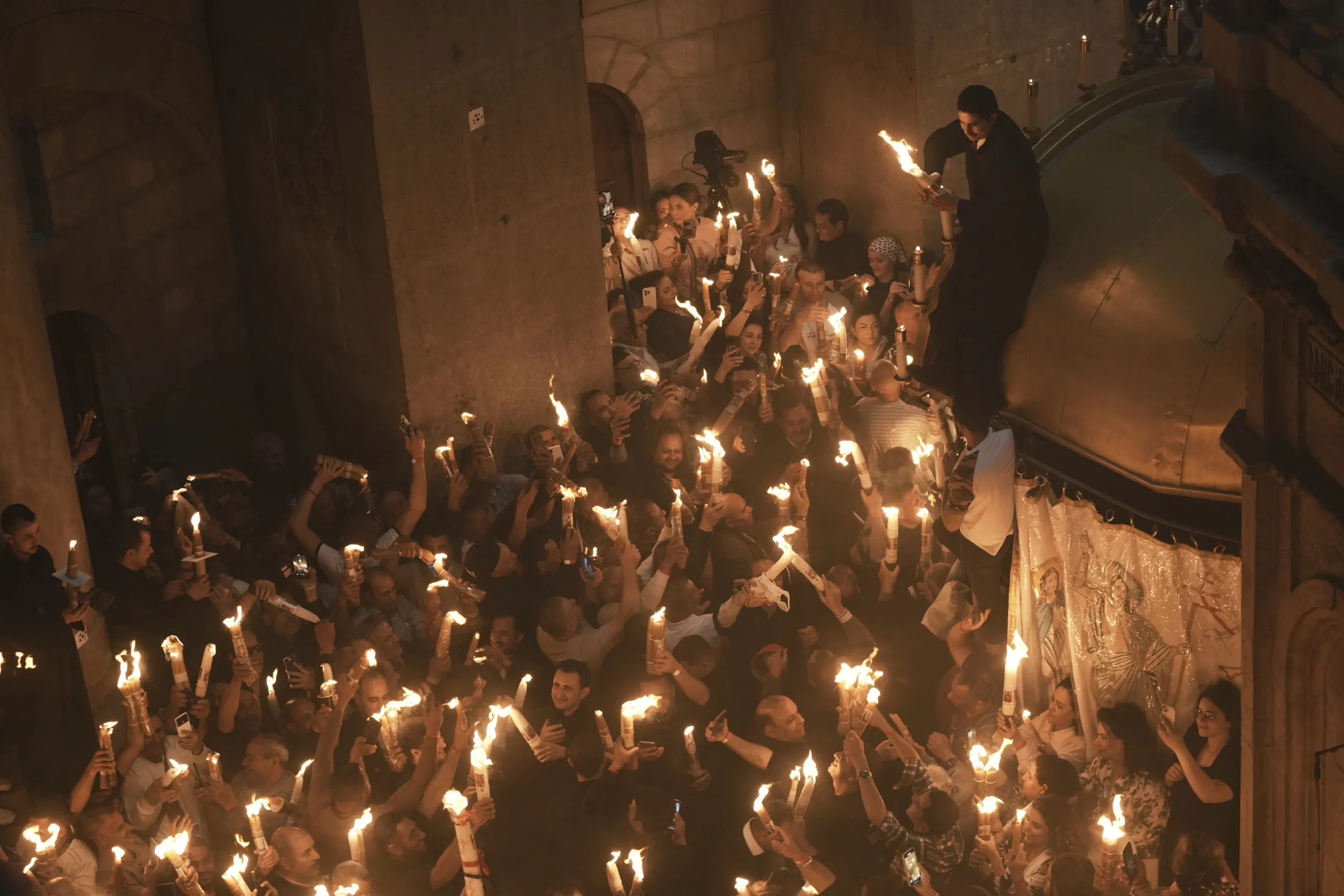 What’s behind the visually stunning ‘Holy Fire’ ceremony in Jerusalem ...