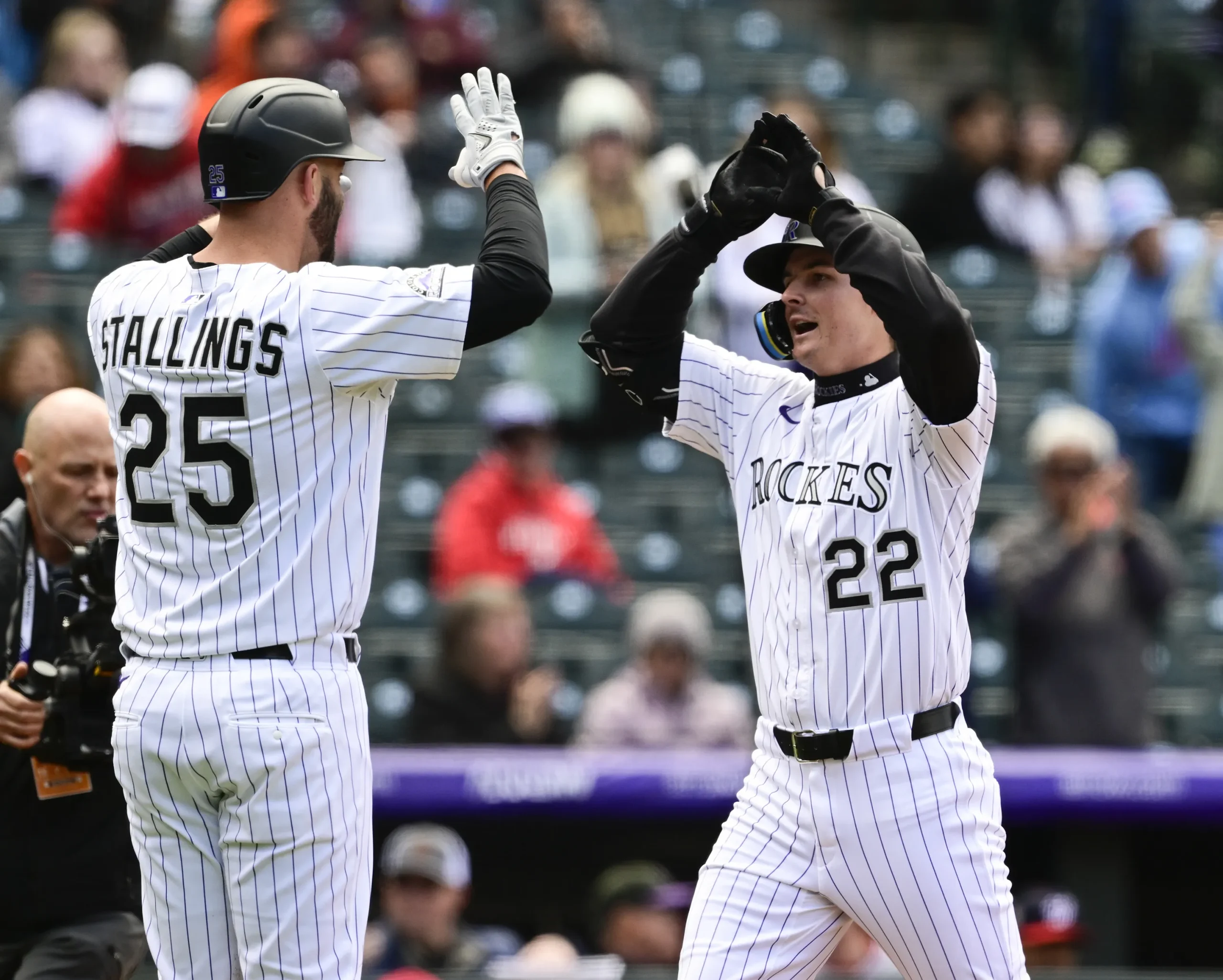 Crews hits 2 of 4 homers by Nationals, who beat Rockies 12-11 after ...