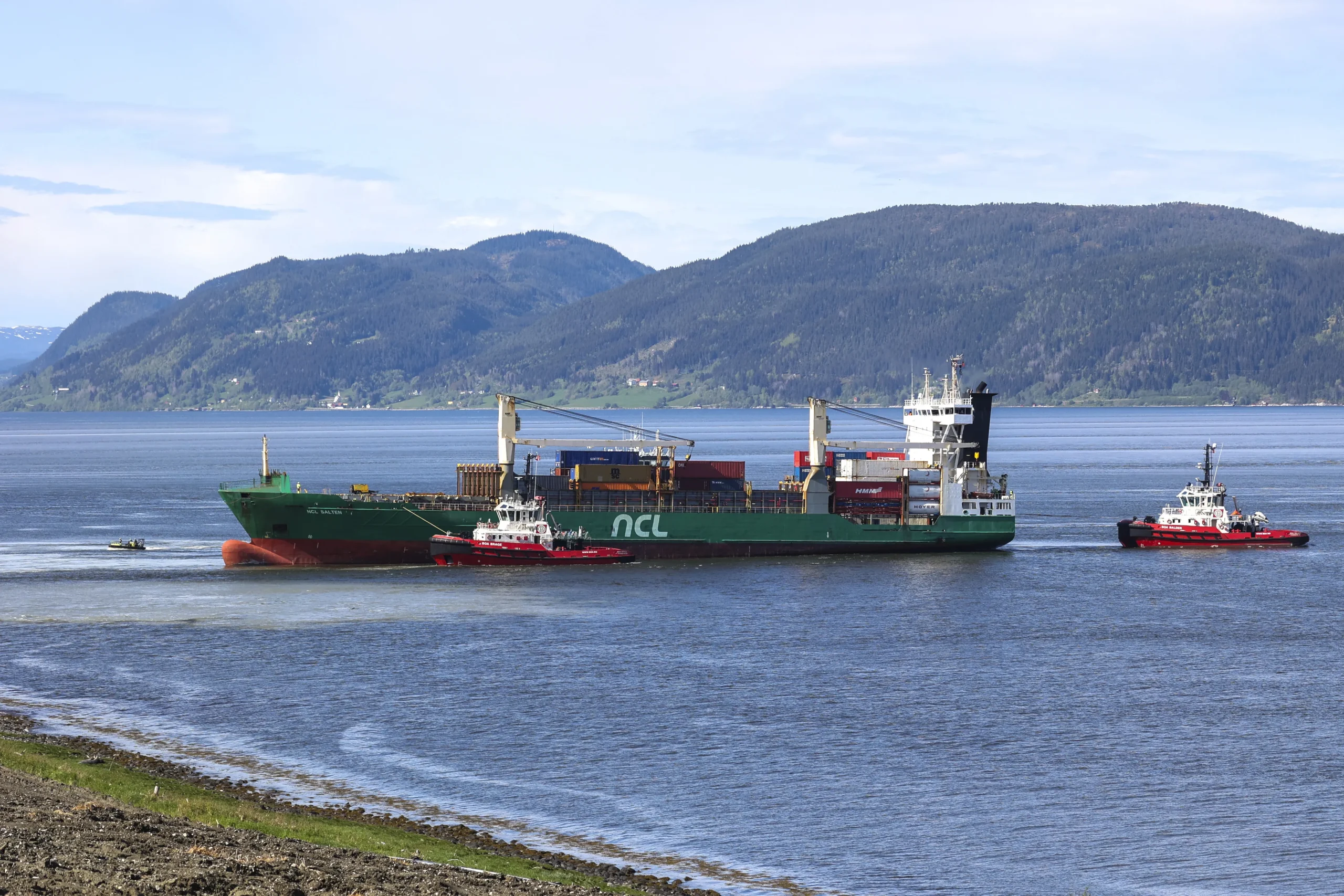 A cargo ship that ran aground in Norway, narrowly missing a house, is ...