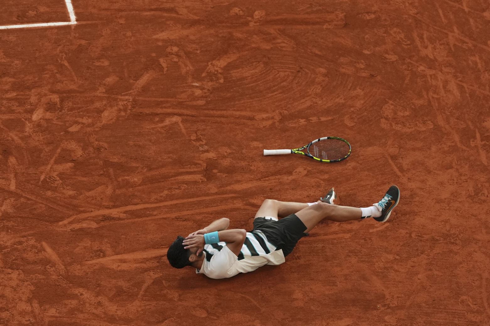 Carlos Alcaraz wins French Open final in five sets after saving 3 match ...
