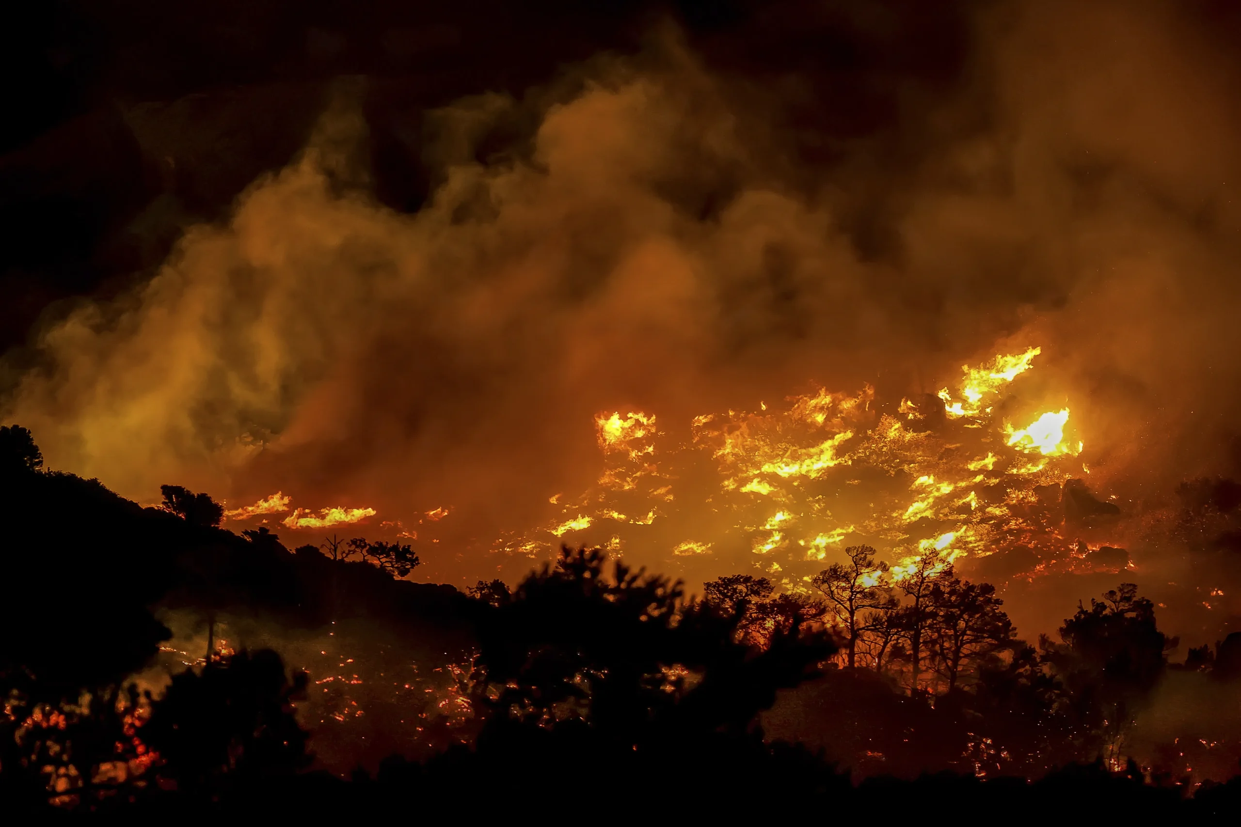 Wildfire on Greek island of Crete prompts evacuations and damages homes ...