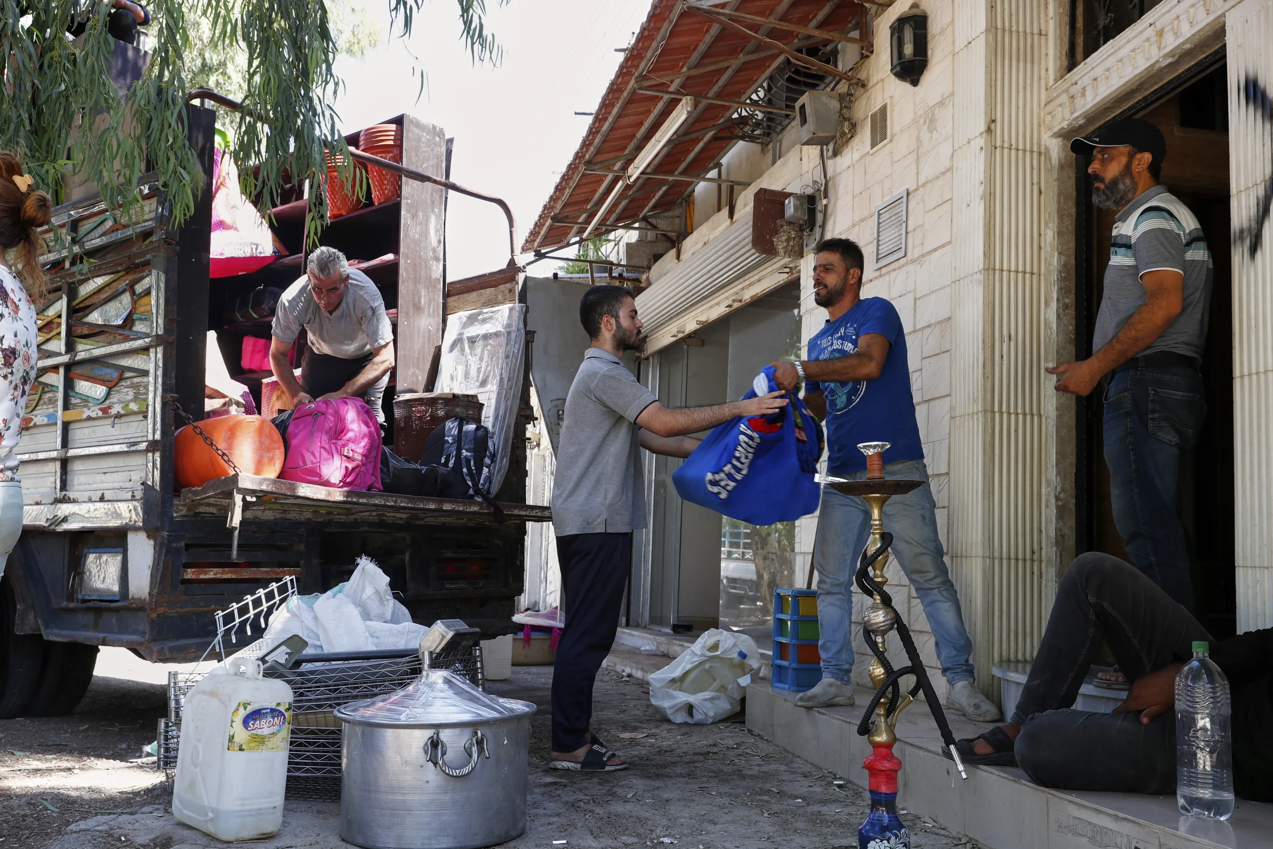 Alawite families flee Damascus suburb after violence and eviction ...