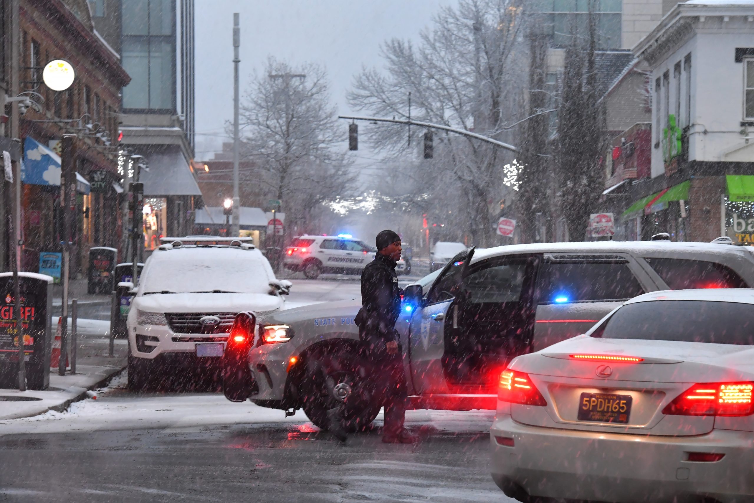 The Latest: A person is in custody after deadly Brown University ...