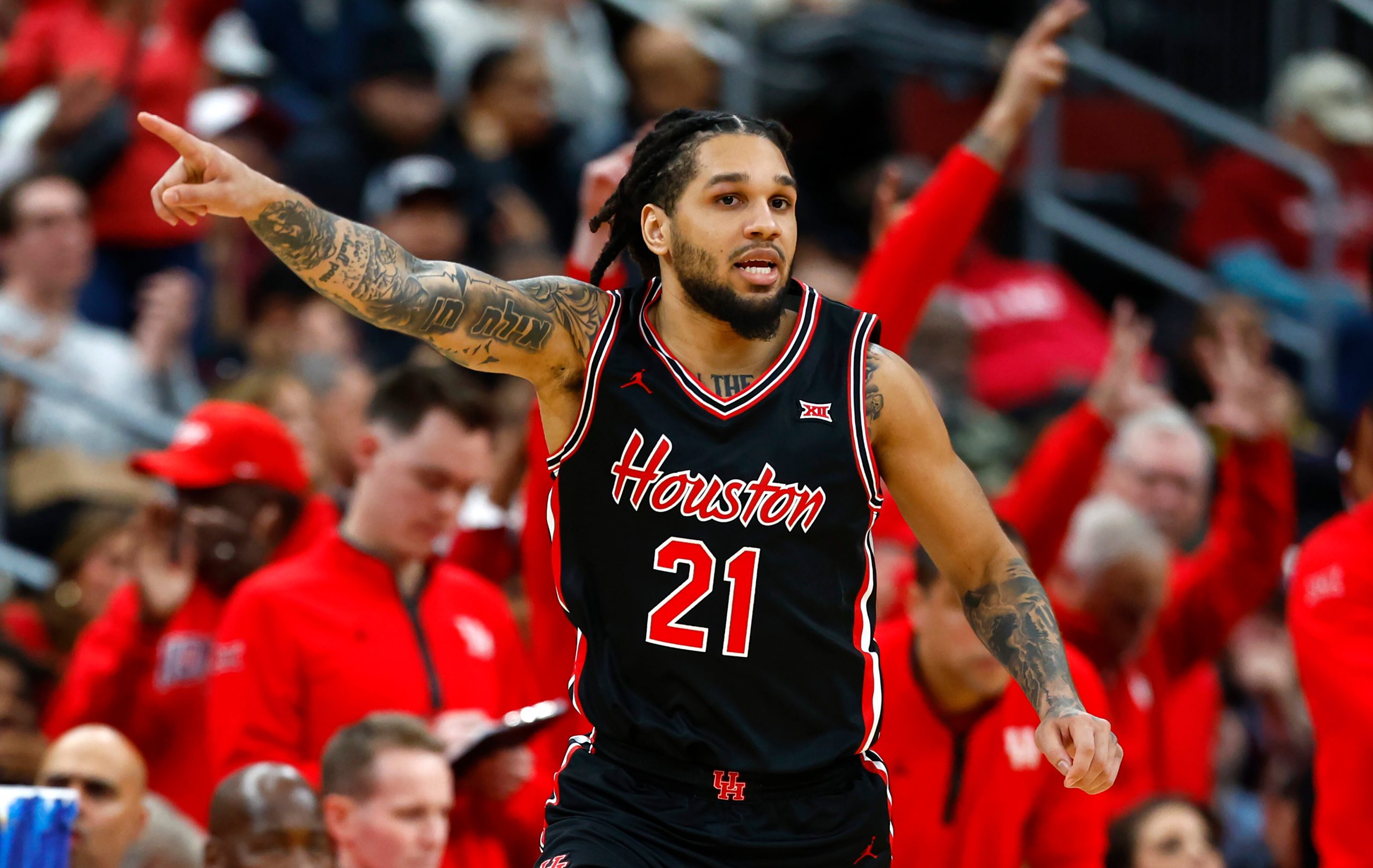 Sharp scores 22 points to lead No. 8 Houston over No. 14 Arkansas, 94 ...