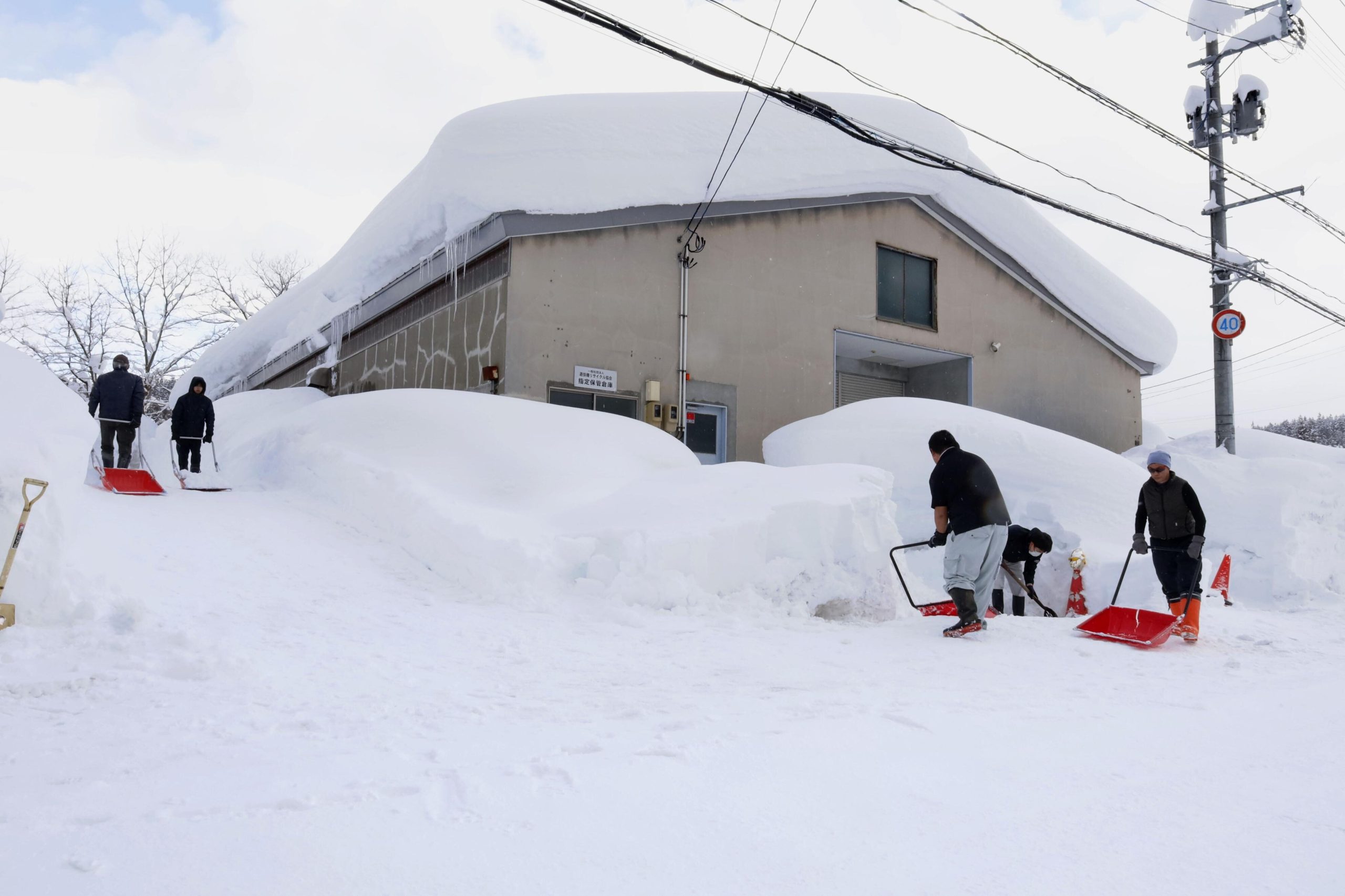 Heavy snow in northern Japan blocks roads and causes dozens of deaths ...