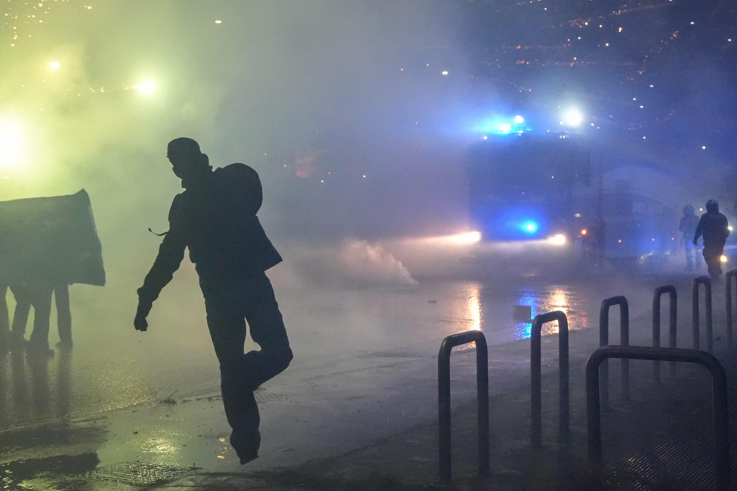 Italian police fire tear gas as protesters clash near Winter Olympics ...