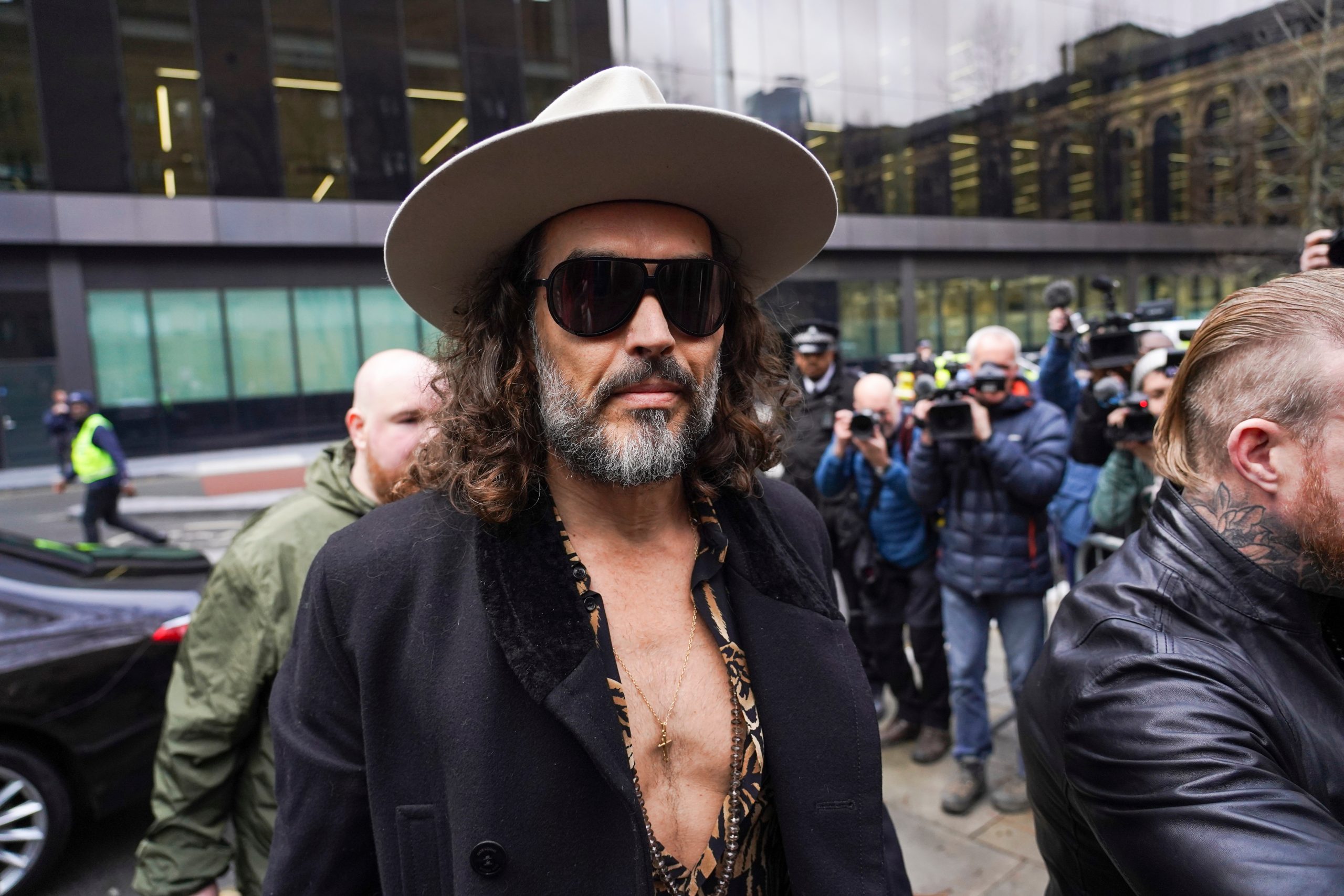 British comedian Russell Brand pleads not guilty to new rape and sexual ...